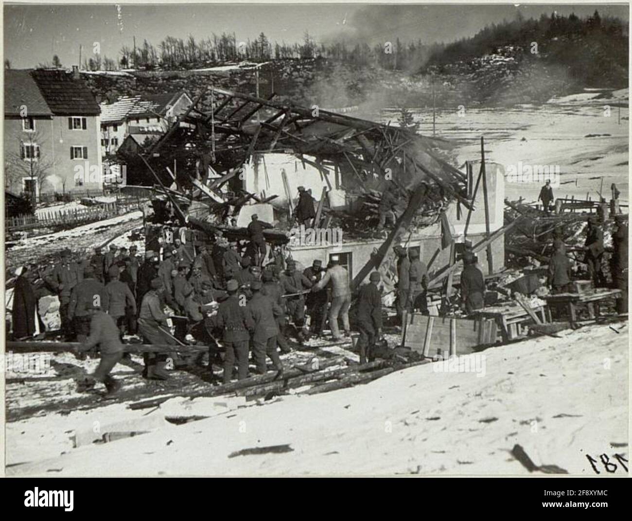 Clean up in a destroyed residential building Stock Photo - Alamy