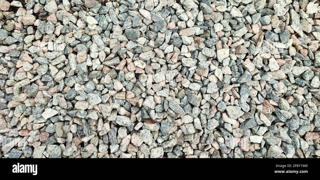 Gray rubble background of many small gravel stones top view Stock Photo ...
