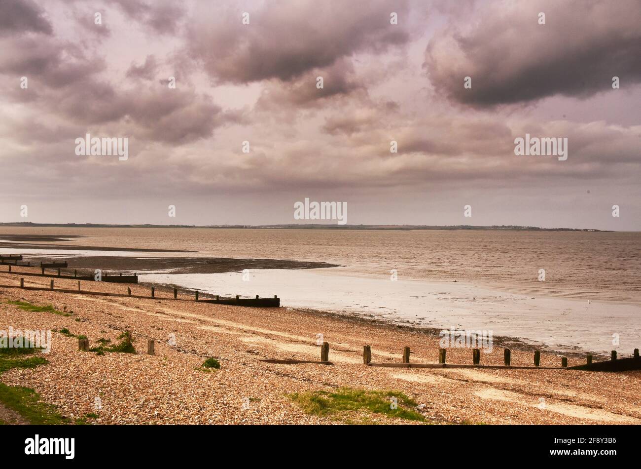 The Beach and Wooden Groynes at Whitstable, Kent, England Stock Photo ...