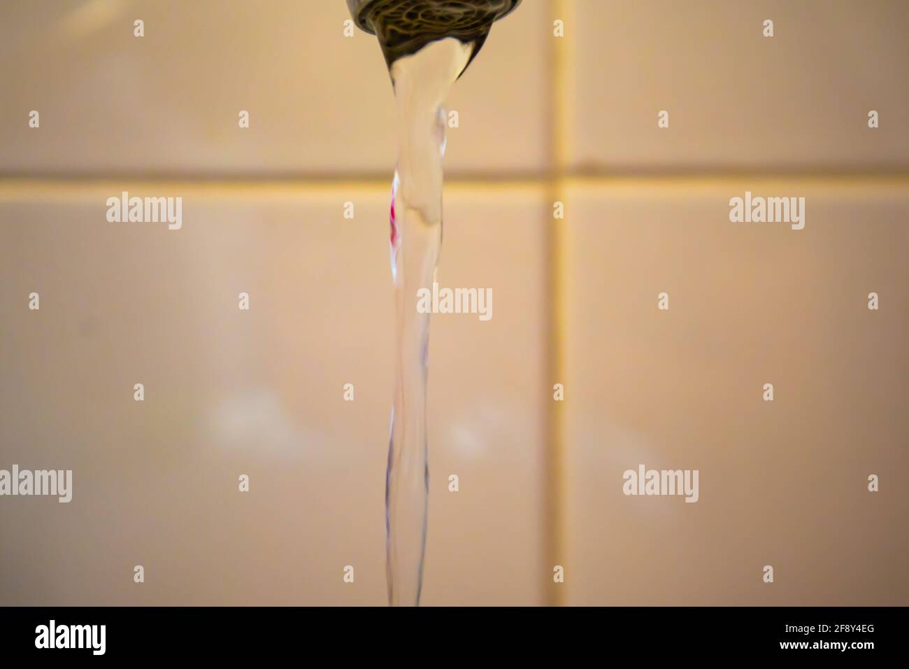 Cape Town, South Africa - 06-04-2021 Close up of water flowing out of ...