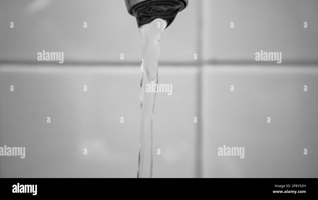 Cape Town, South Africa - 06-04-2021 Close up of water flowing out of ...