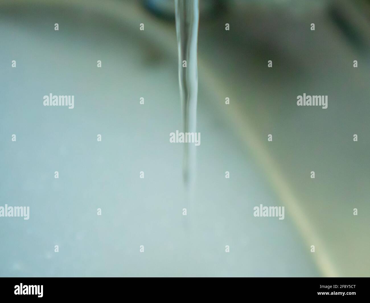 Cape Town, South Africa - 06-04-2021 Kitchen tap filling sink with ...