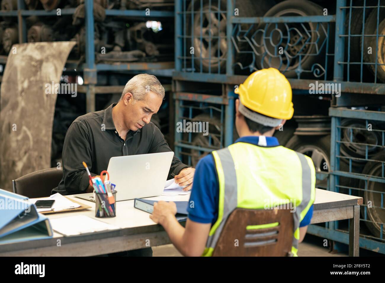 Stressed warehouse worker hi-res stock photography and images - Alamy