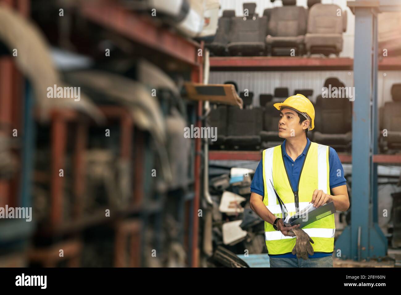 Asian male worker working to checking products stock inventory at ...