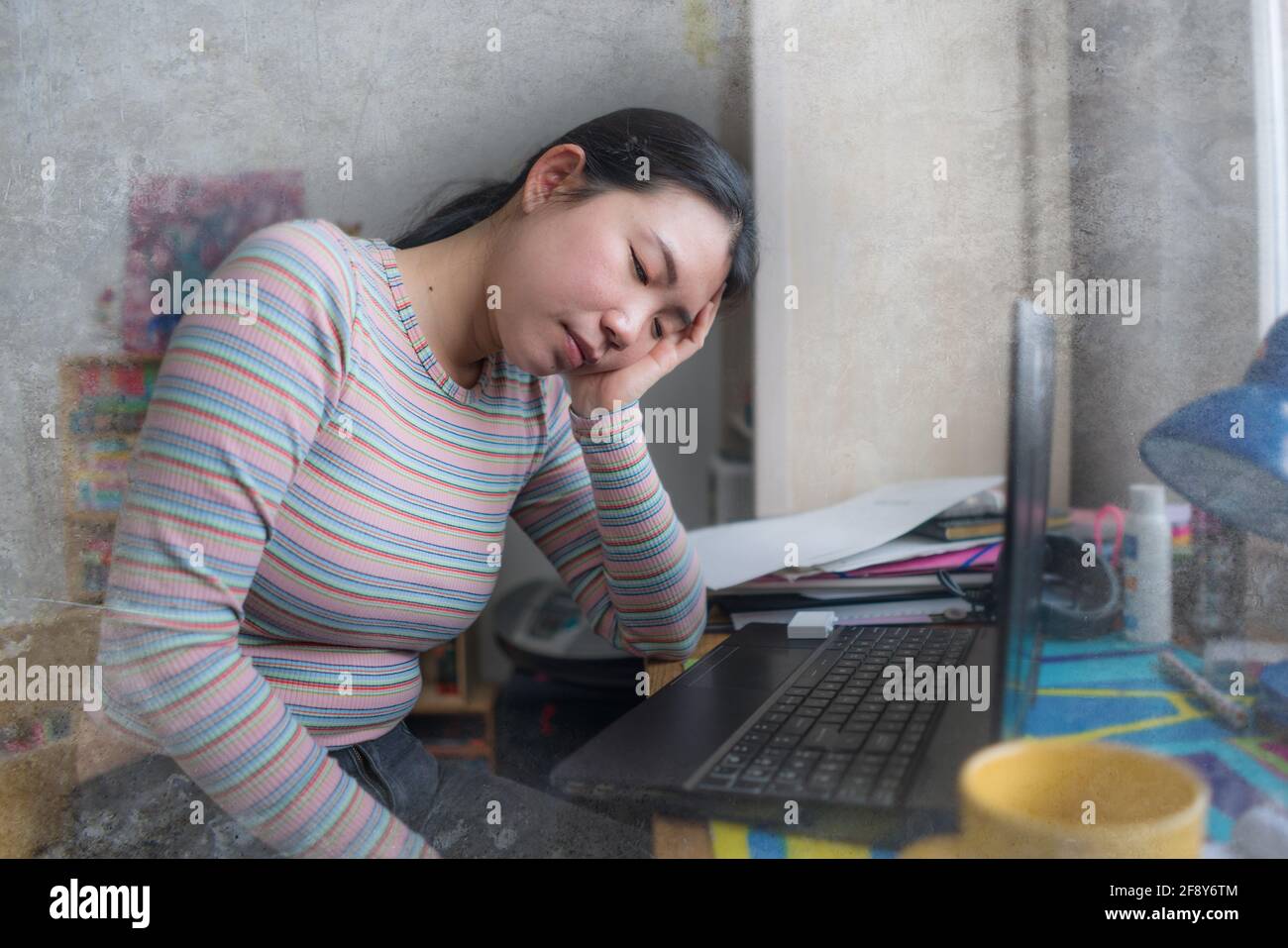 lifestyle portrait of young stressed and worried Asian Japanese woman ...