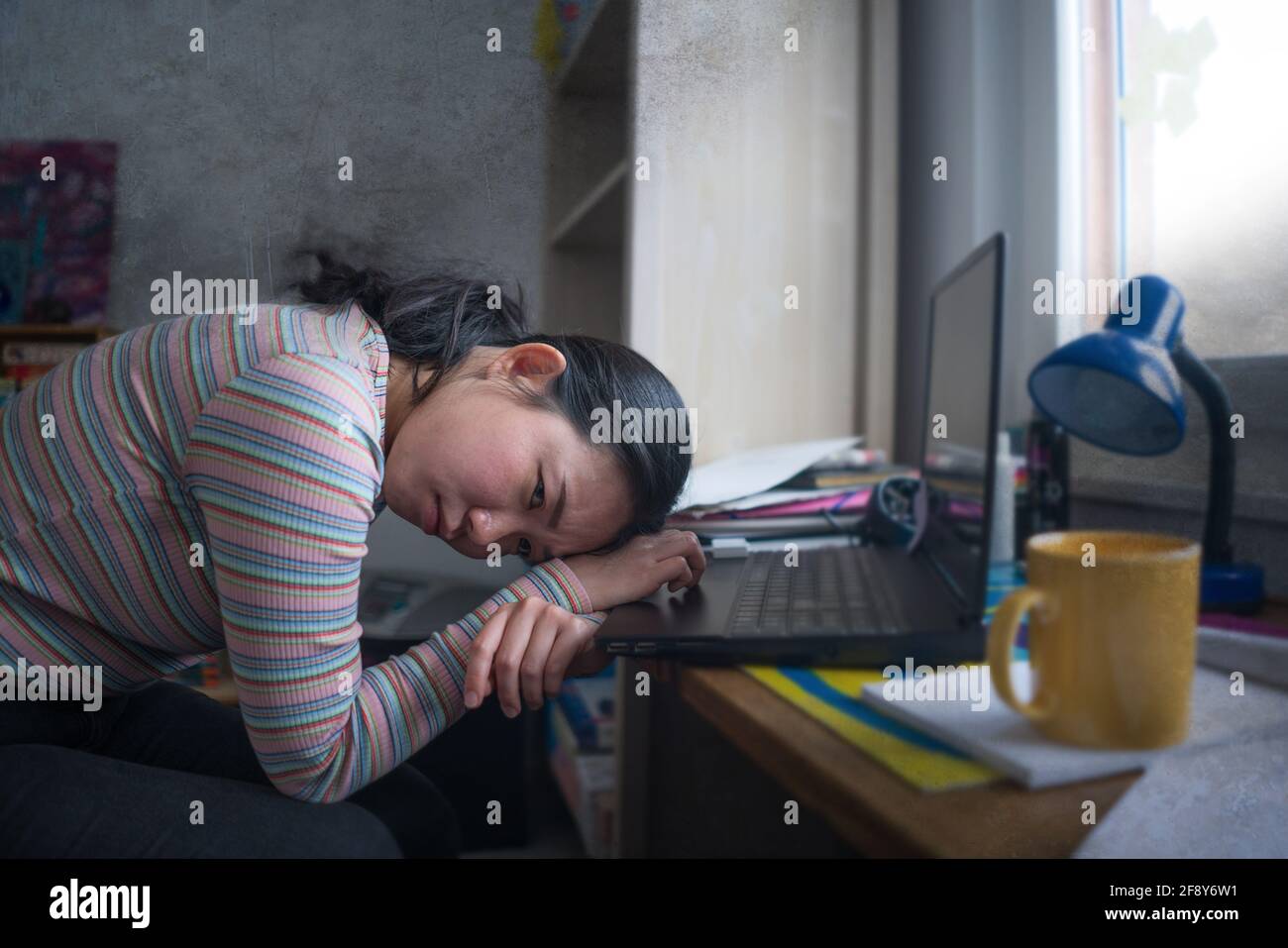 lifestyle portrait of young stressed and worried Asian Japanese woman ...