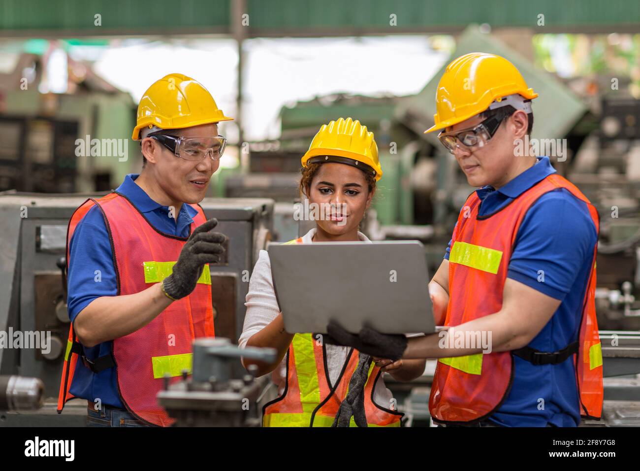 engineer women working with male team mix race work help together in ...