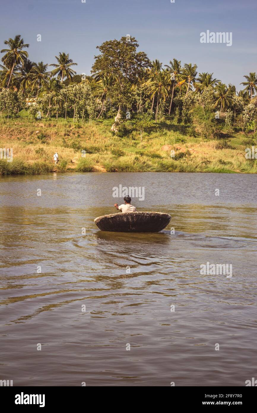Coracle ride, Tungabhadra river, Hampi, Karnataka, India Stock Photo ...