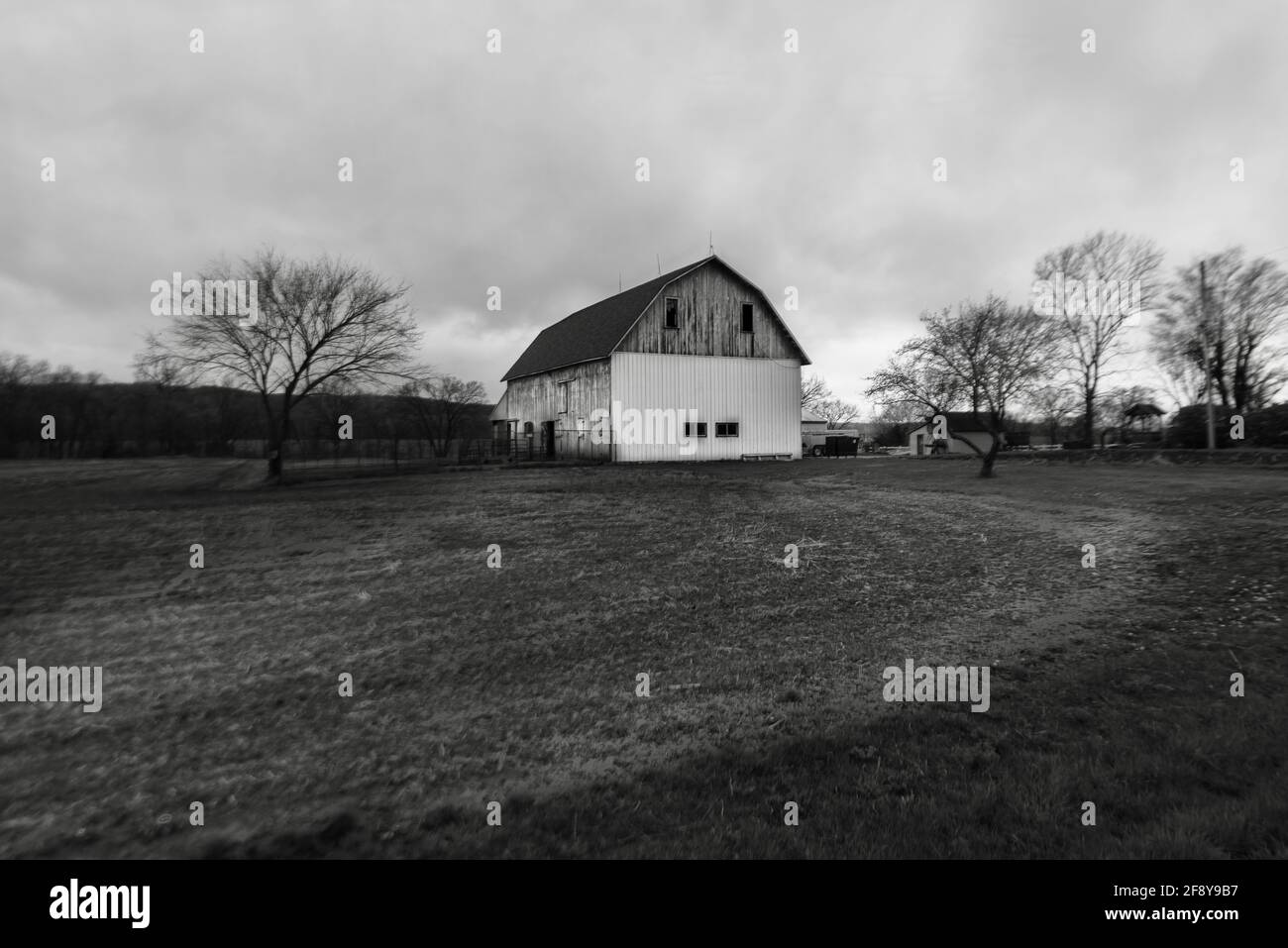 Rustic barn dark clouds hi-res stock photography and images - Alamy