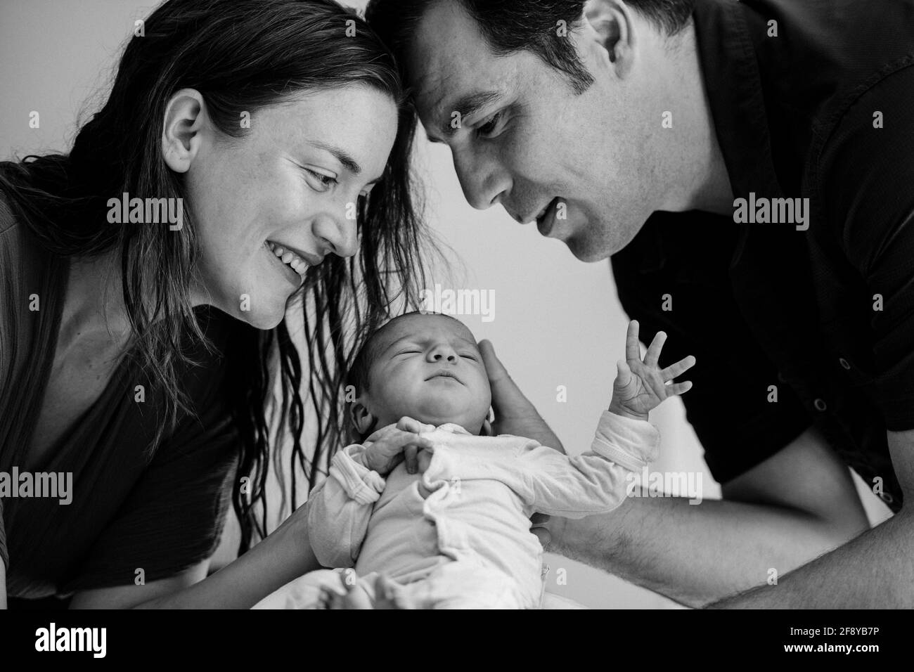 Black baby white parents hi-res stock photography and images - Alamy