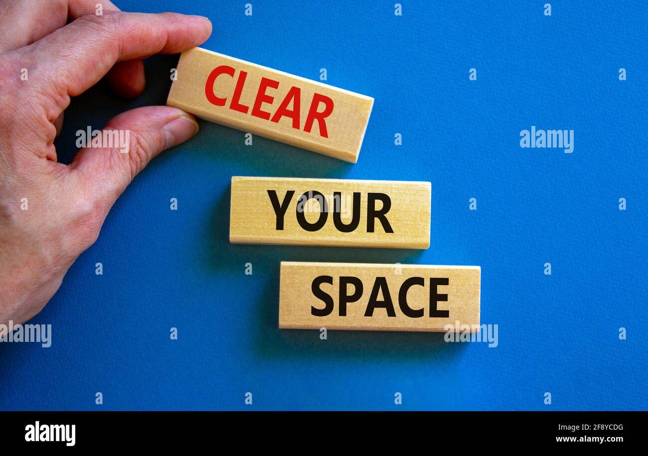 Clear your space symbol. Wooden blocks with words 'Clear your space ...