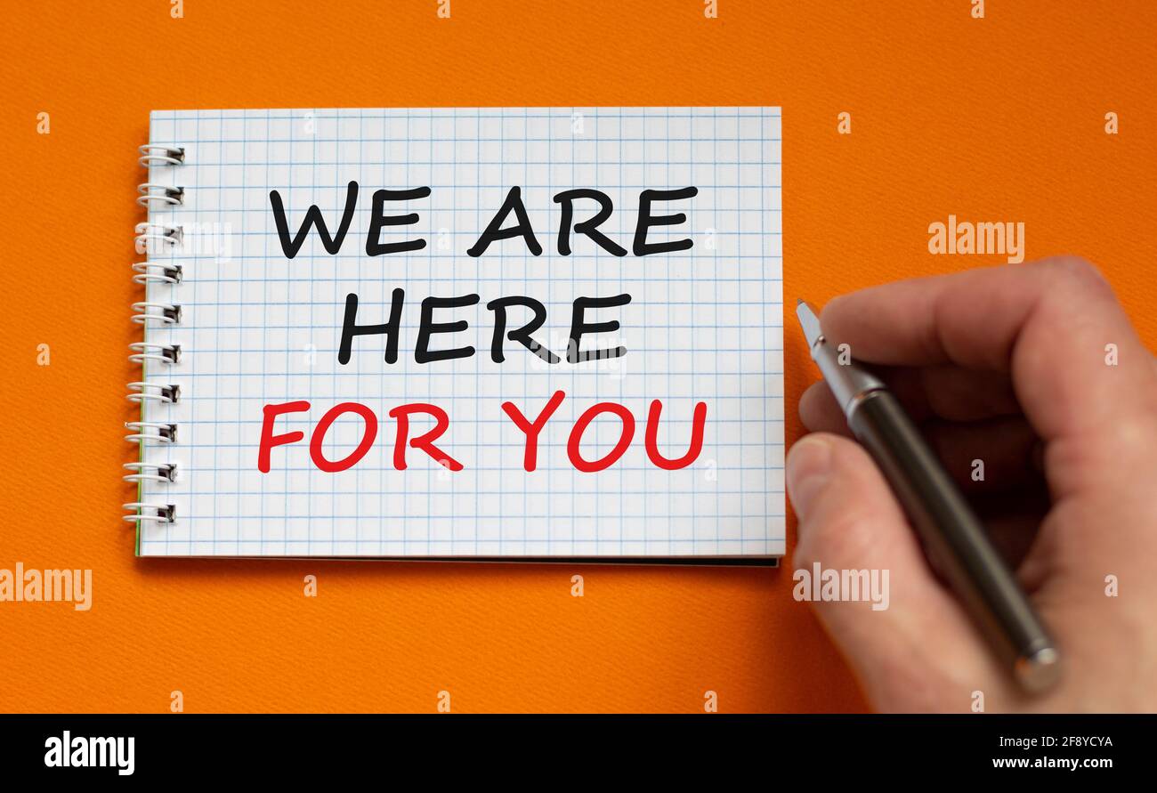 Support symbol. White note with words 'we are here for you ...