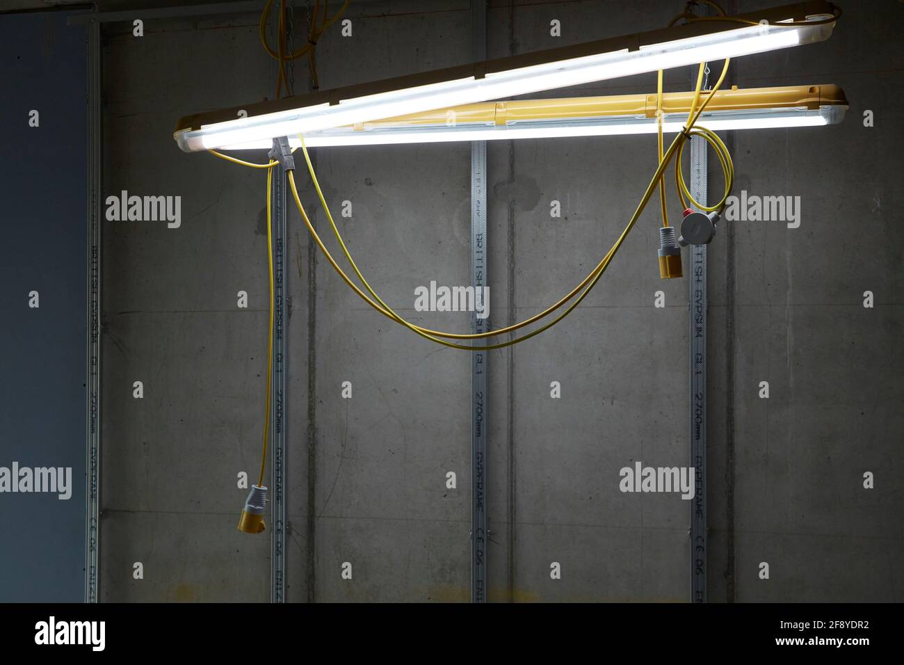 Construction lights on buildings site attached to stud wall Stock Photo ...