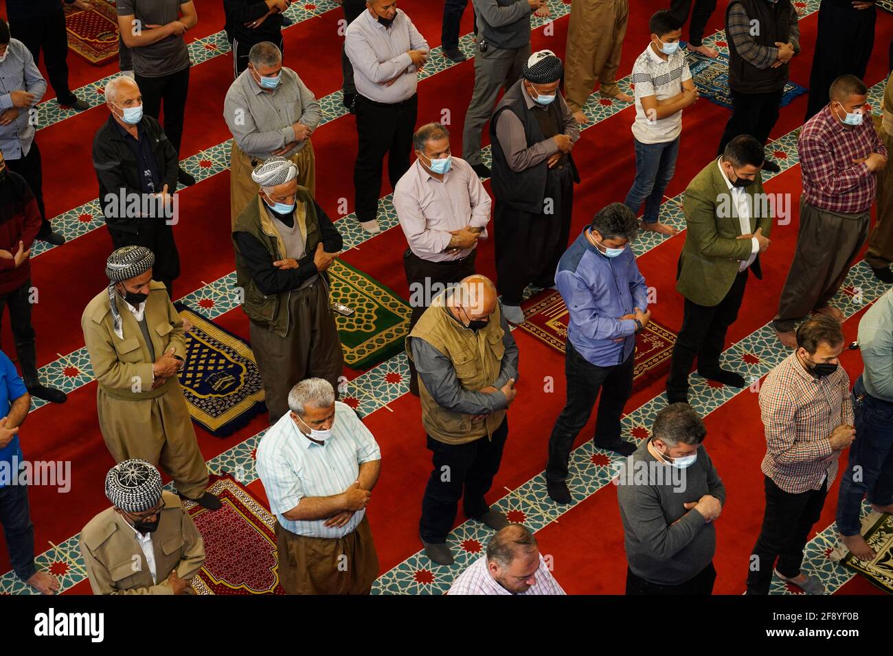 Kurdish muslims praying in mosque hi-res stock photography and images ...