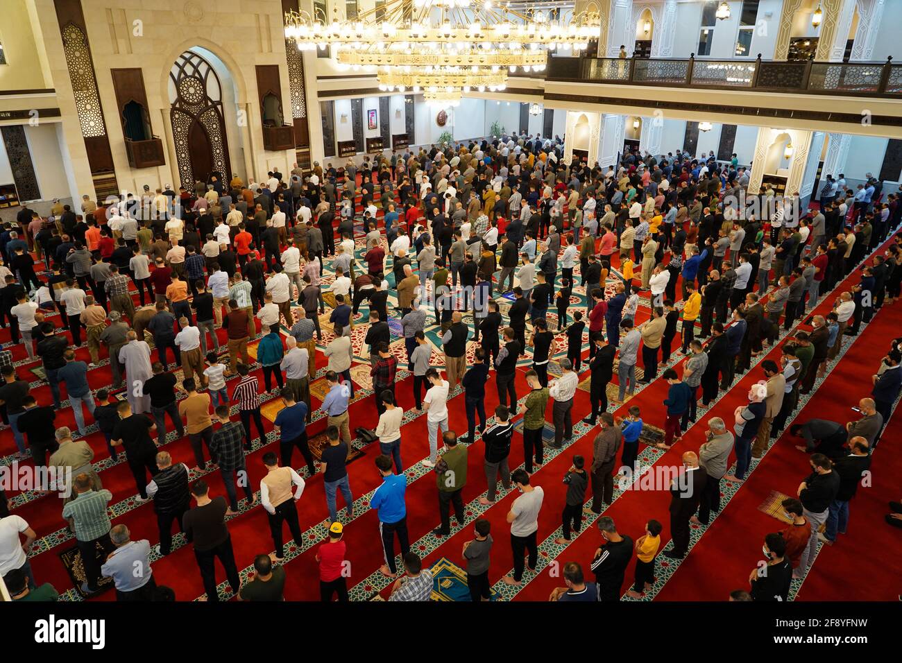 Iraqi Kurdish people maintain social distance as they offer Tarawih ...
