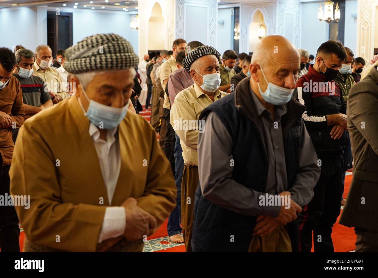Kurdish muslims praying in mosque hi-res stock photography and images ...