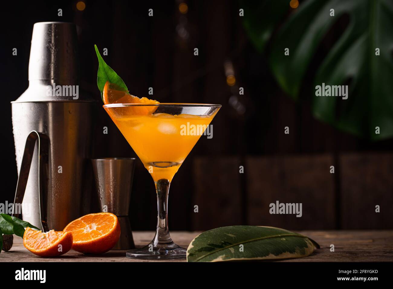 Orange martini cocktail in rustic style Stock Photo - Alamy