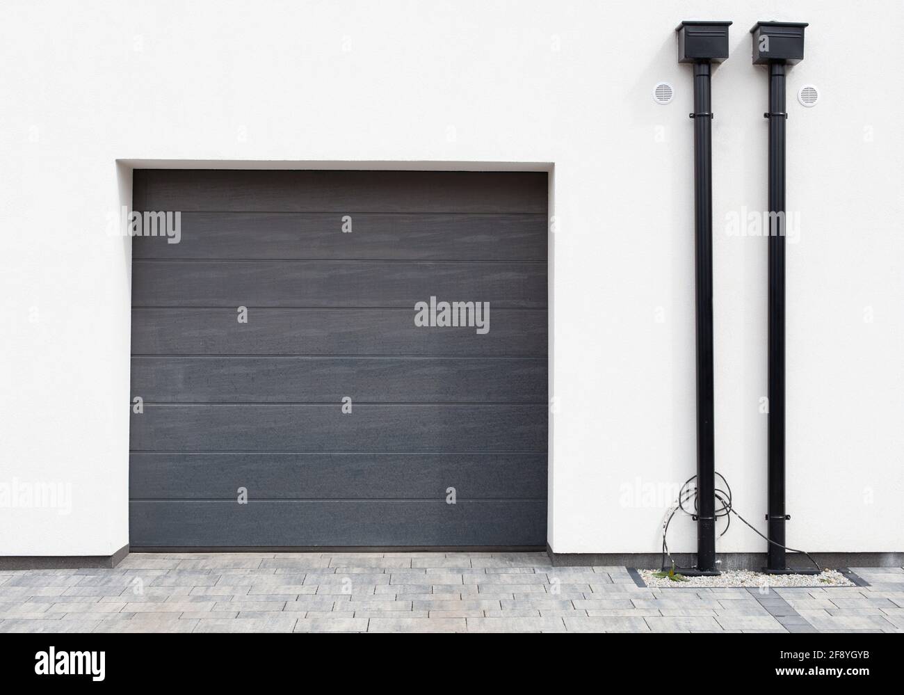 Modern gray garage, the Scandinavian-style house. Private garage with ...