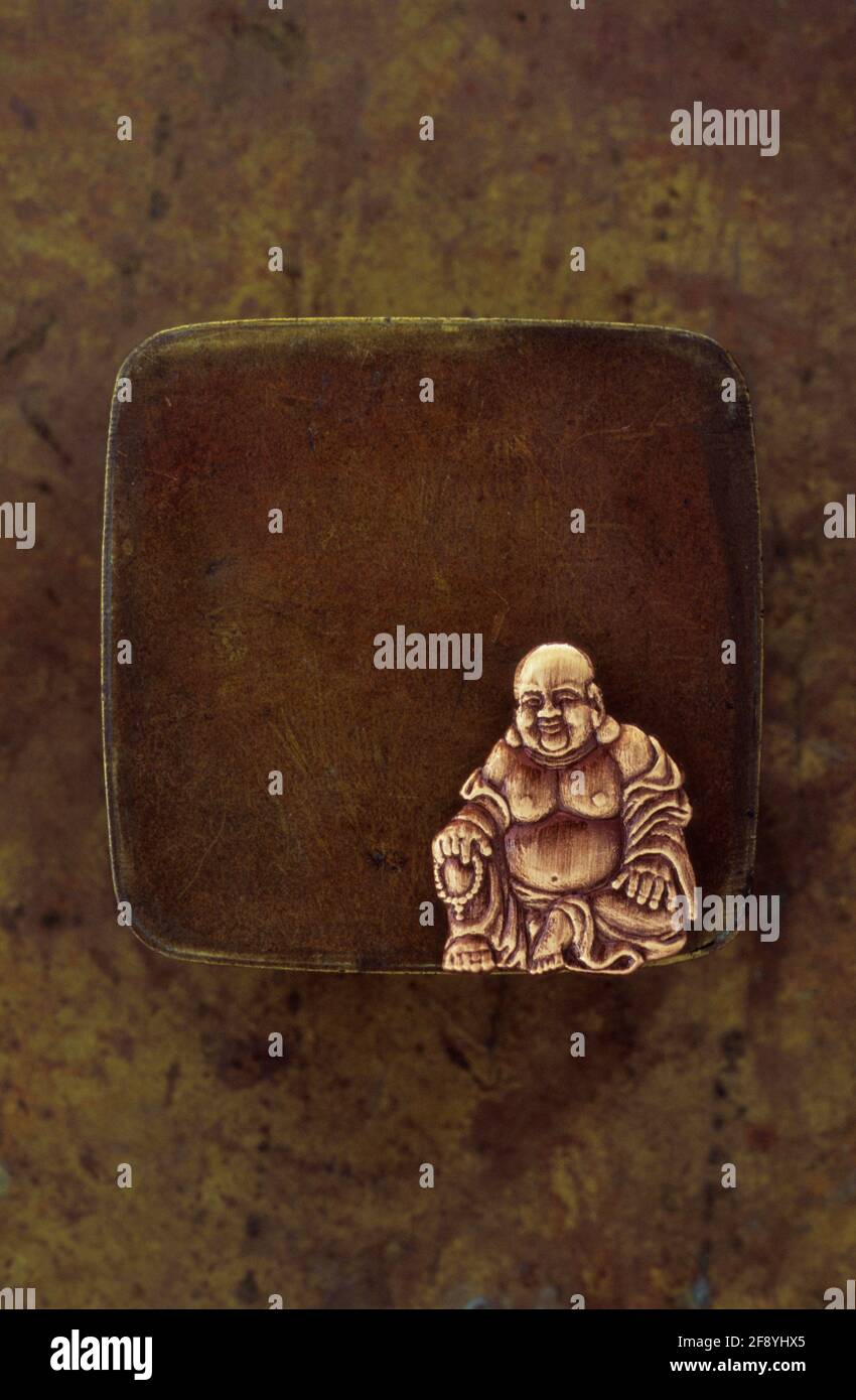 Copper model or badge or pin of seated Buddha with tarnished brass ...