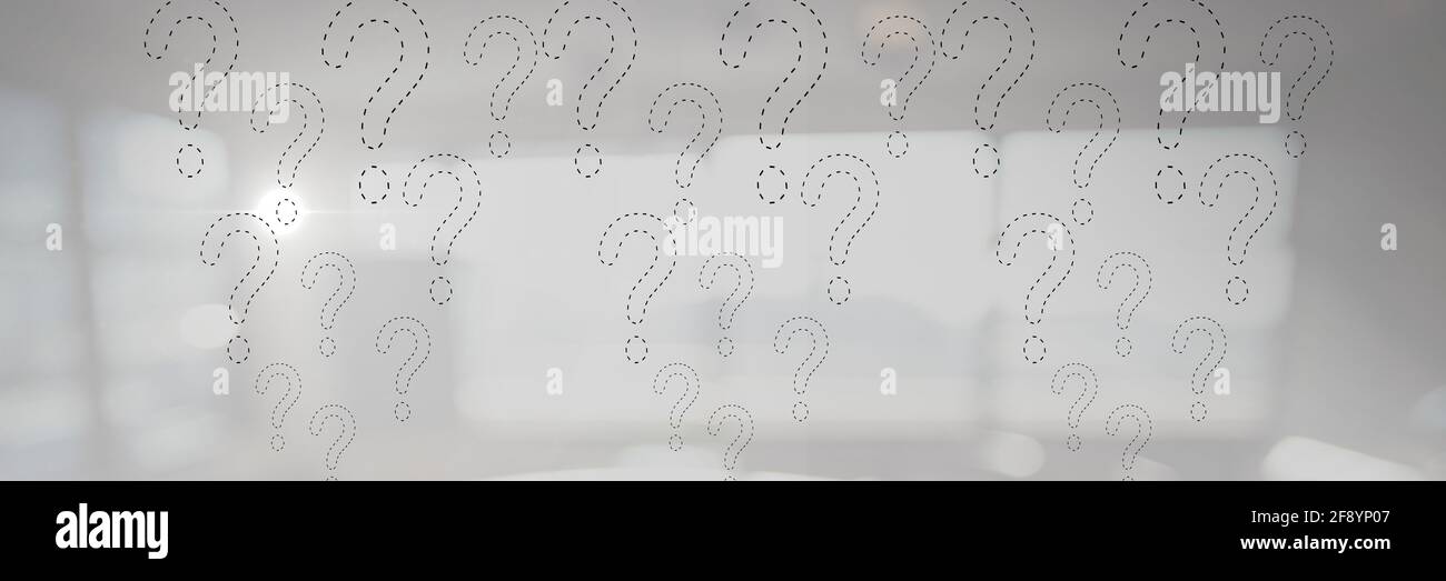 Multiple question marks against a white office building background ...