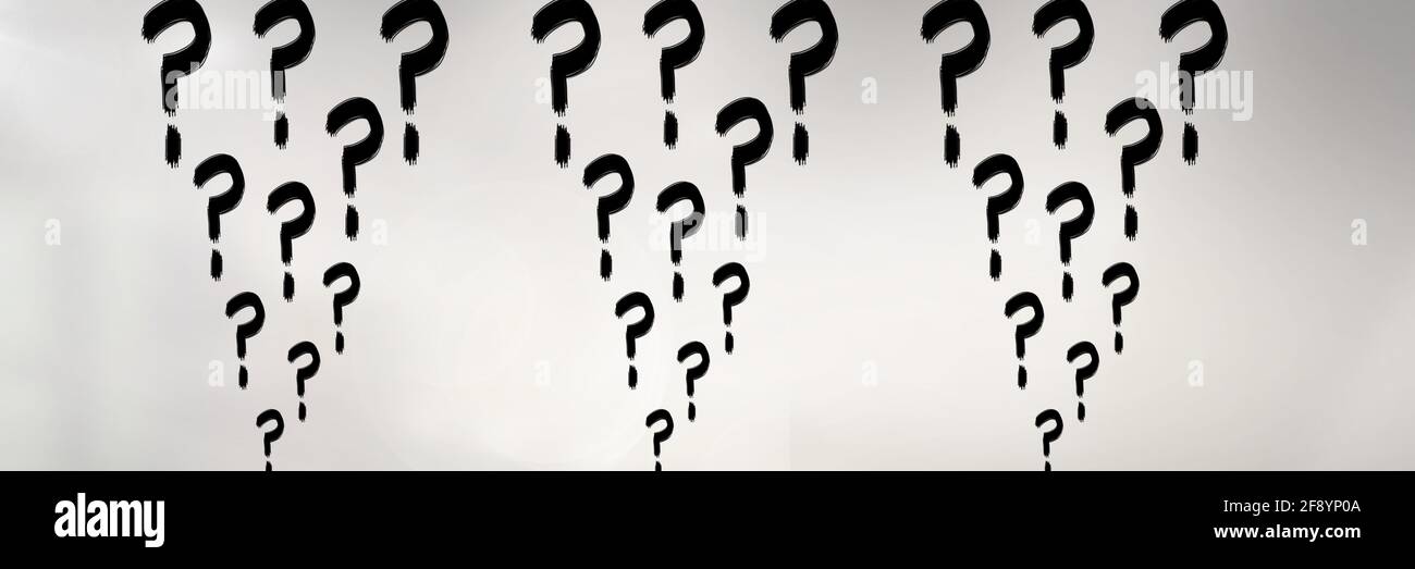 Multiple black question marks against a white office building ...