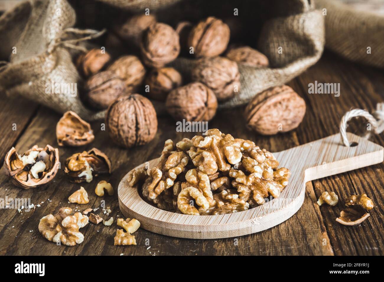 Half walnut kernel whole walnuts hi-res stock photography and images ...