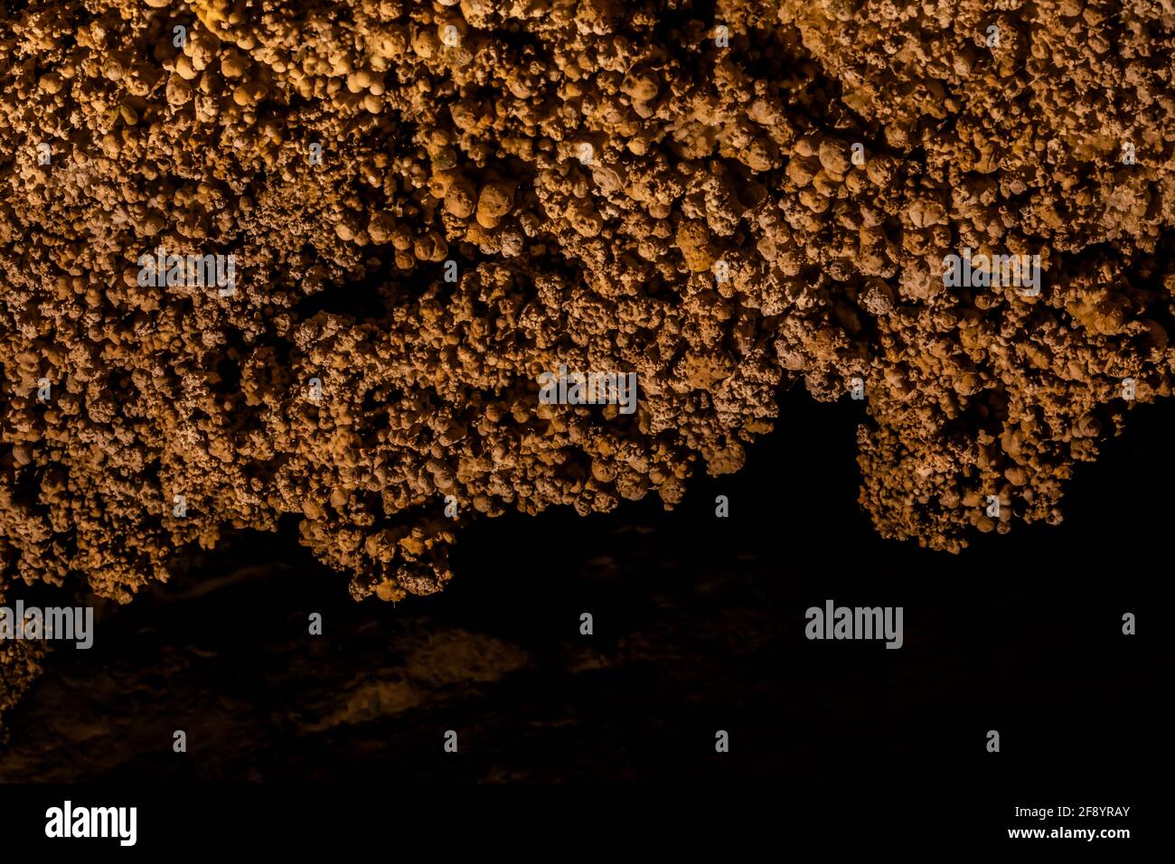 Cave Popcorn on stalactites deep underground in Carlsbad Caverns ...