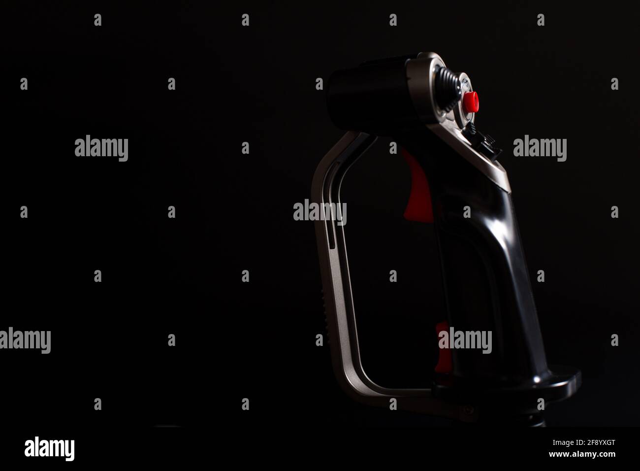 Airplane controller for video games with trigger, on black background ...