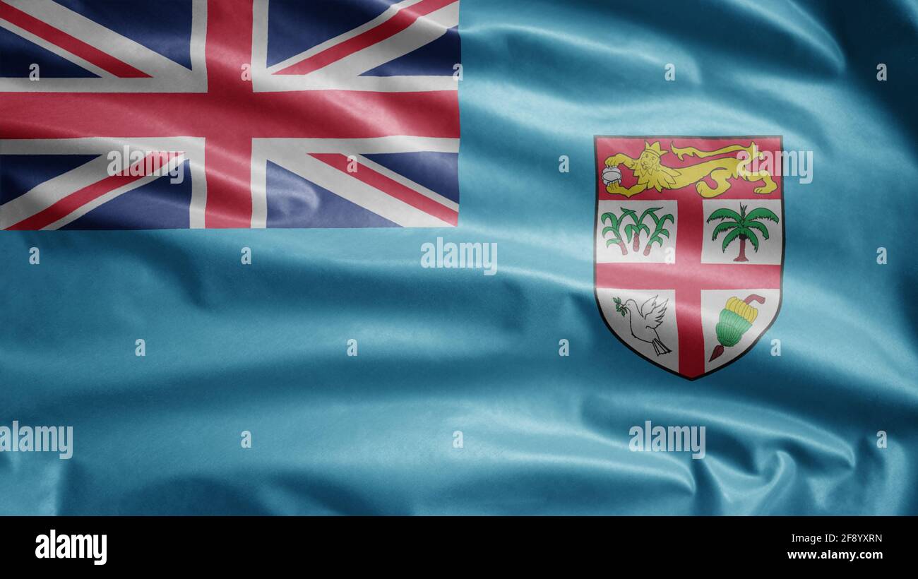 Fijian flag waving in the wind. Close up of Fiji banner blowing, soft ...