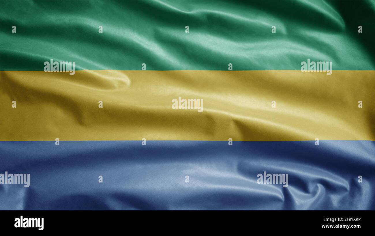 Gabonese flag waving in the wind. Close up of Gabon banner blowing ...