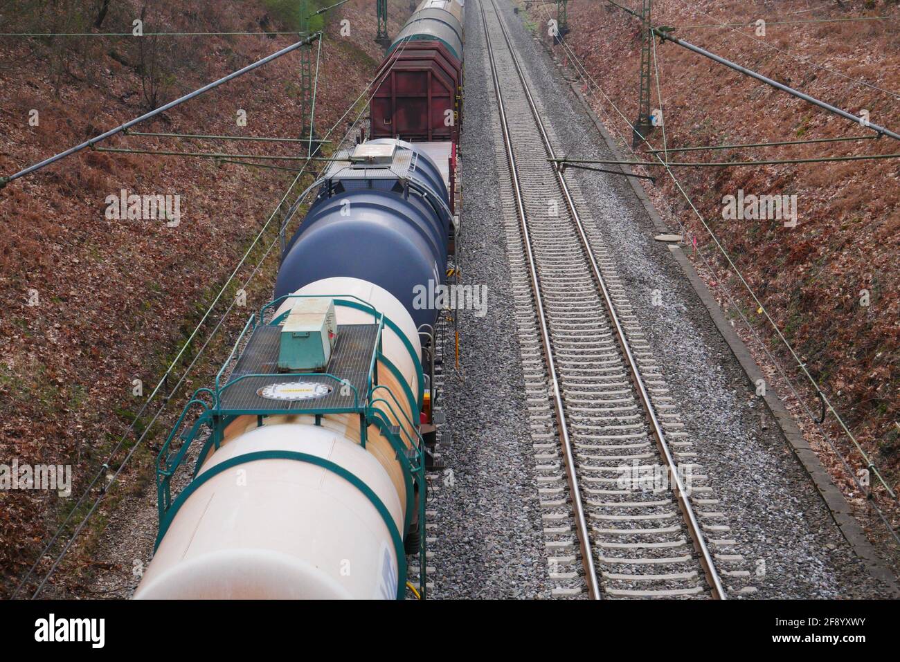 blue and white tank wagons of a freight train Stock Photo - Alamy