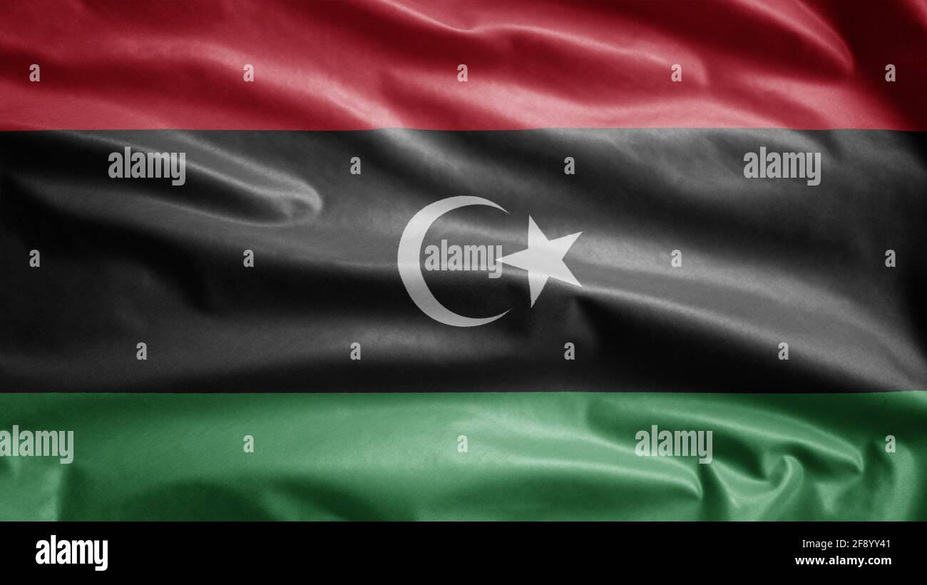 Libyan flag waving in the wind. Close up of Libya banner blowing, soft ...
