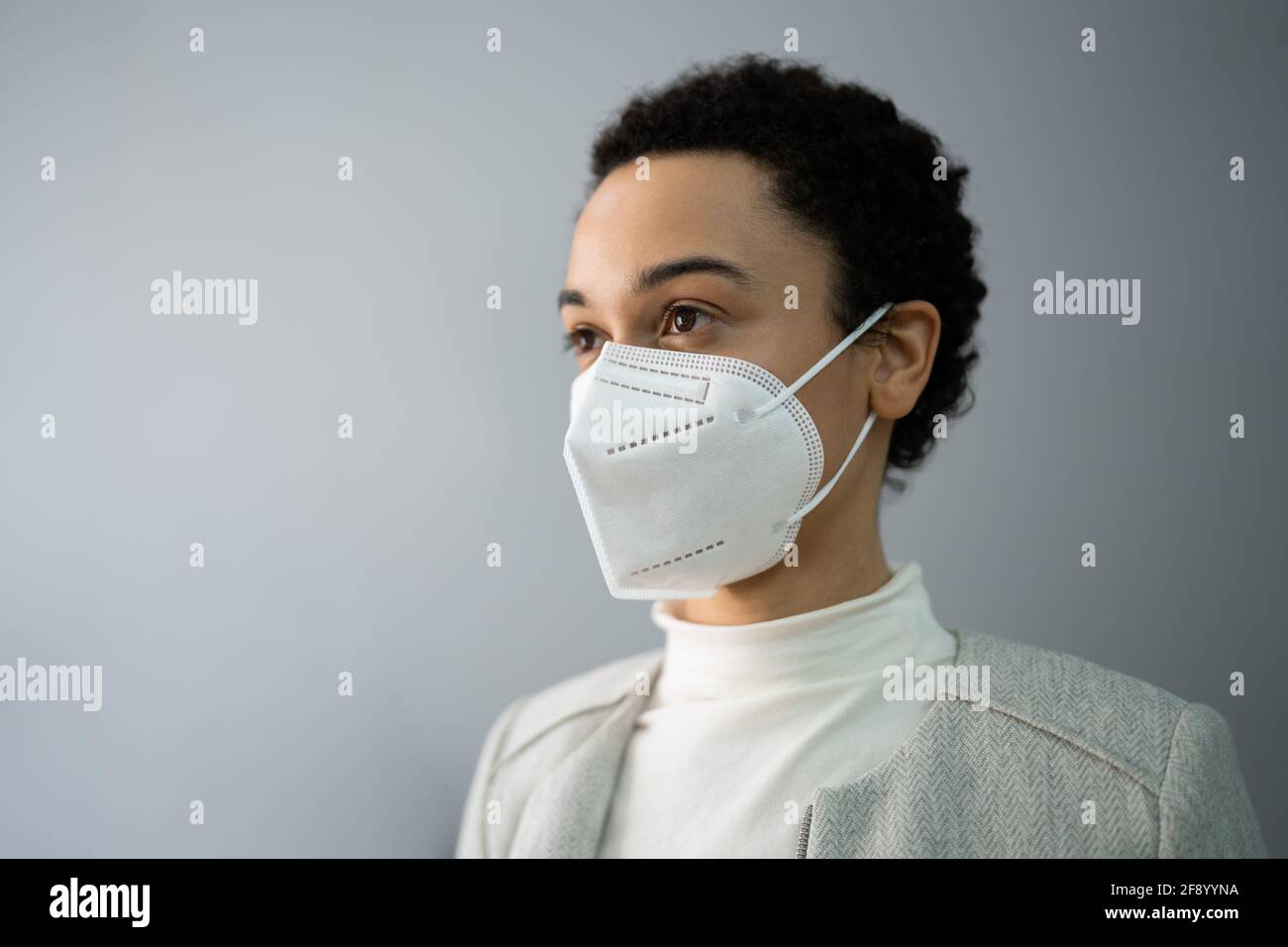 African American Woman In Arms Covid Face Mask Stock Photo - Alamy
