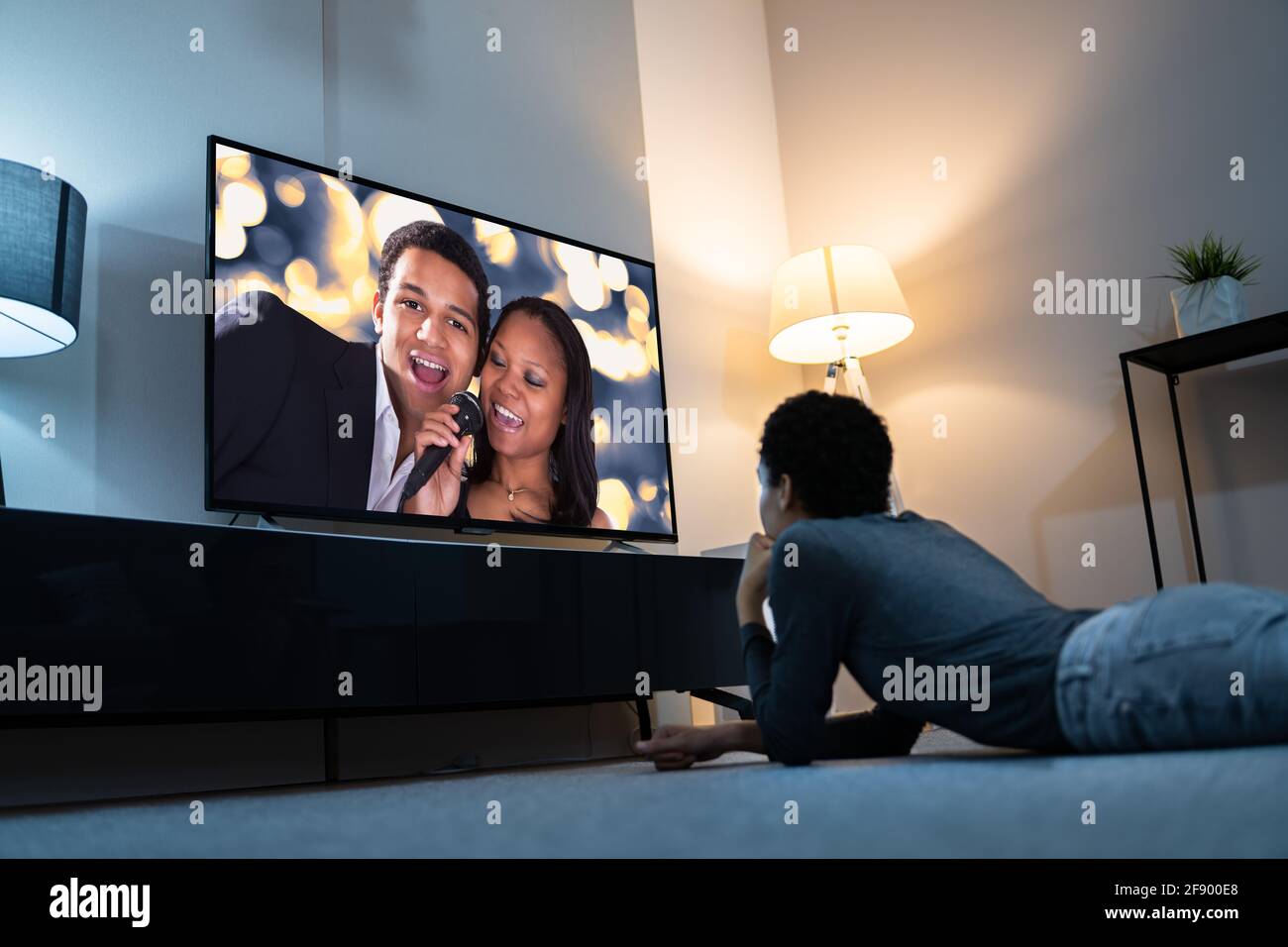 Woman Watching Tv At Night