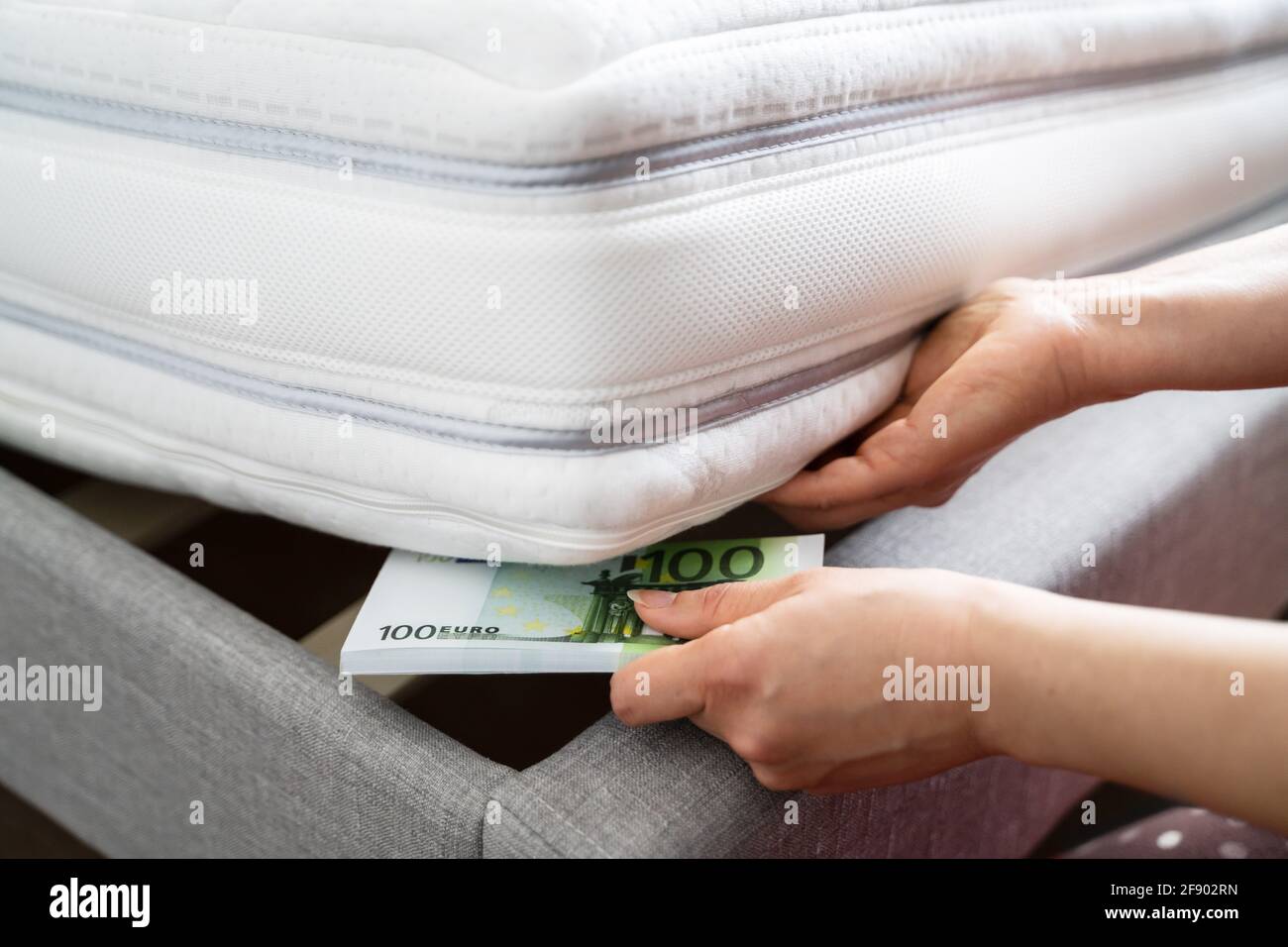 Money under the bed euros hi-res stock photography and images - Alamy