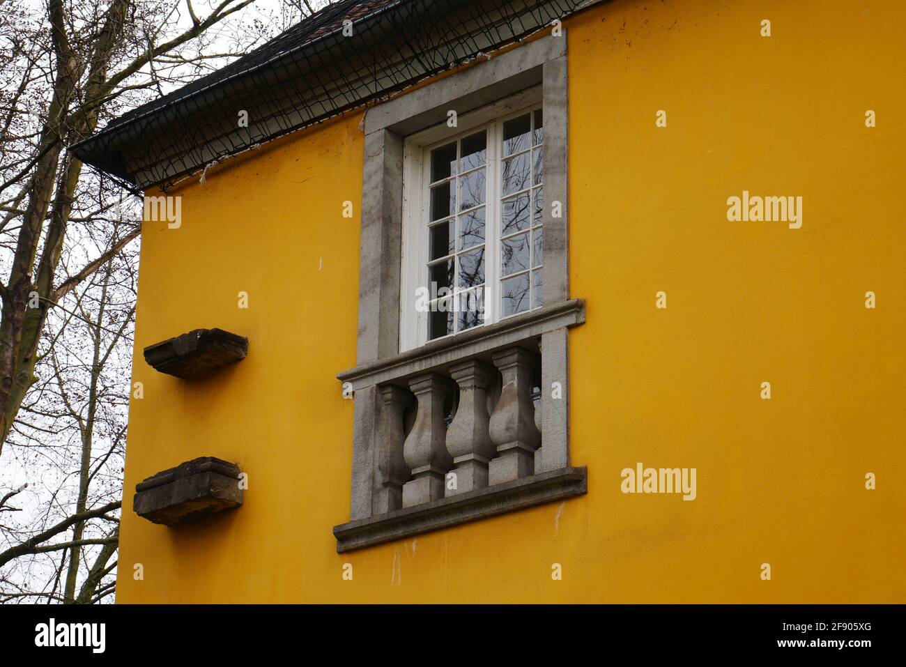 wooden window with french balcony of a building from the rococo late ...