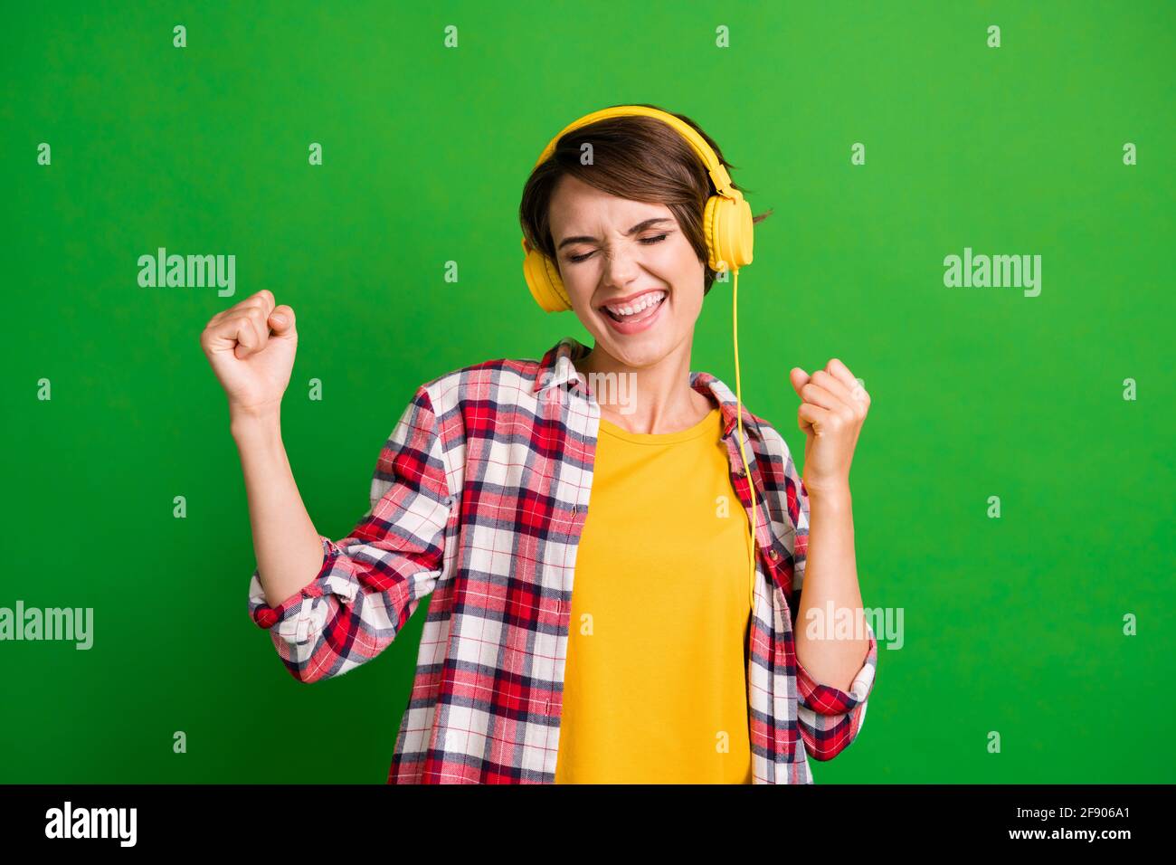Photo of adorable optimistic short hairstyle lady listen music closed ...