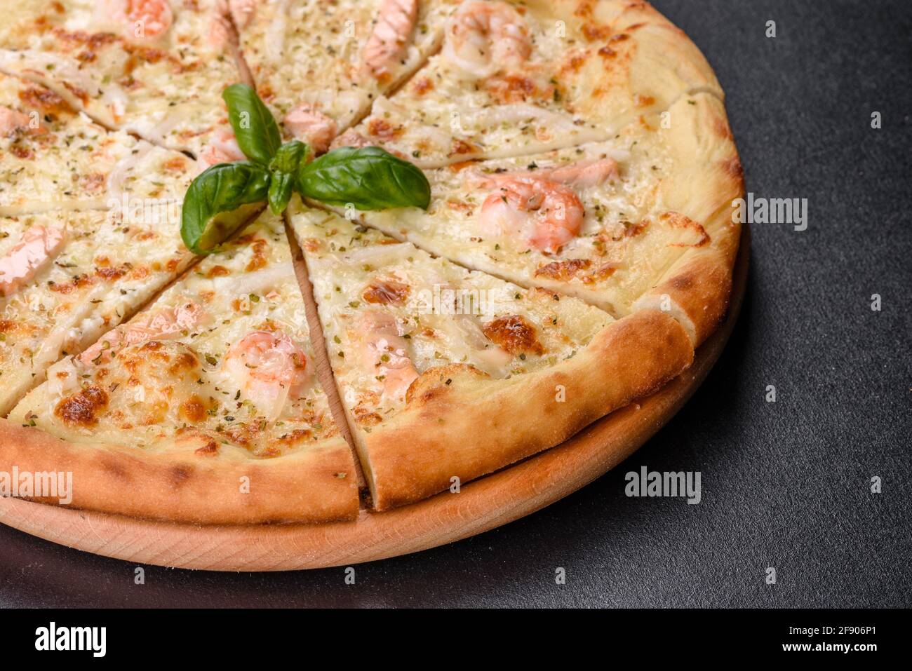 Delicious fresh seafood oven pizza: red fish and shrimp. Healthy food ...