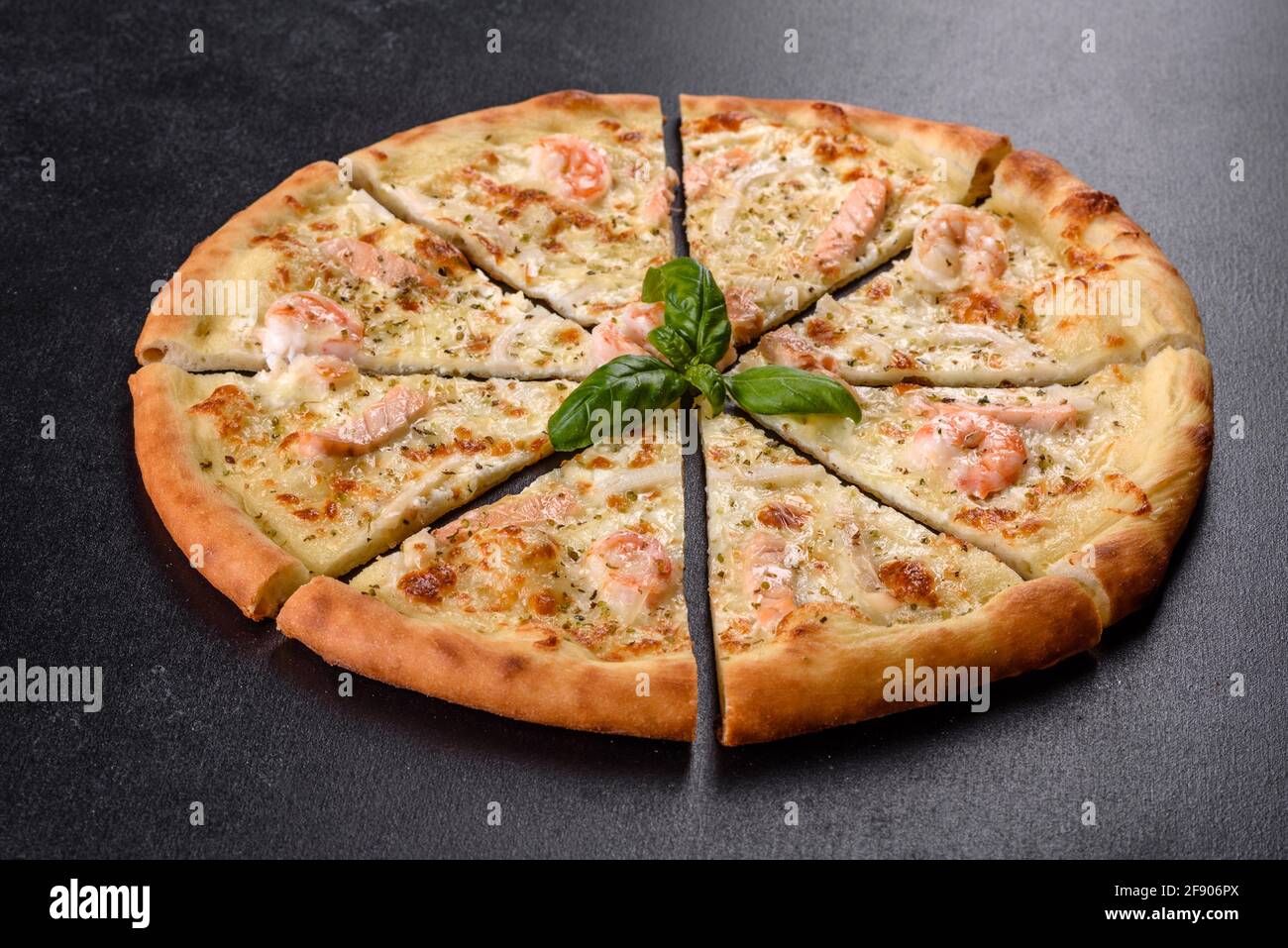 Delicious fresh seafood oven pizza: red fish and shrimp. Healthy food ...