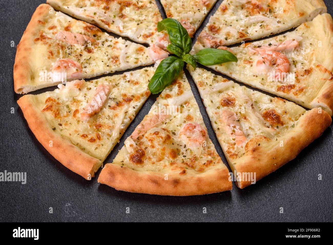 Delicious fresh seafood oven pizza: red fish and shrimp. Healthy food ...