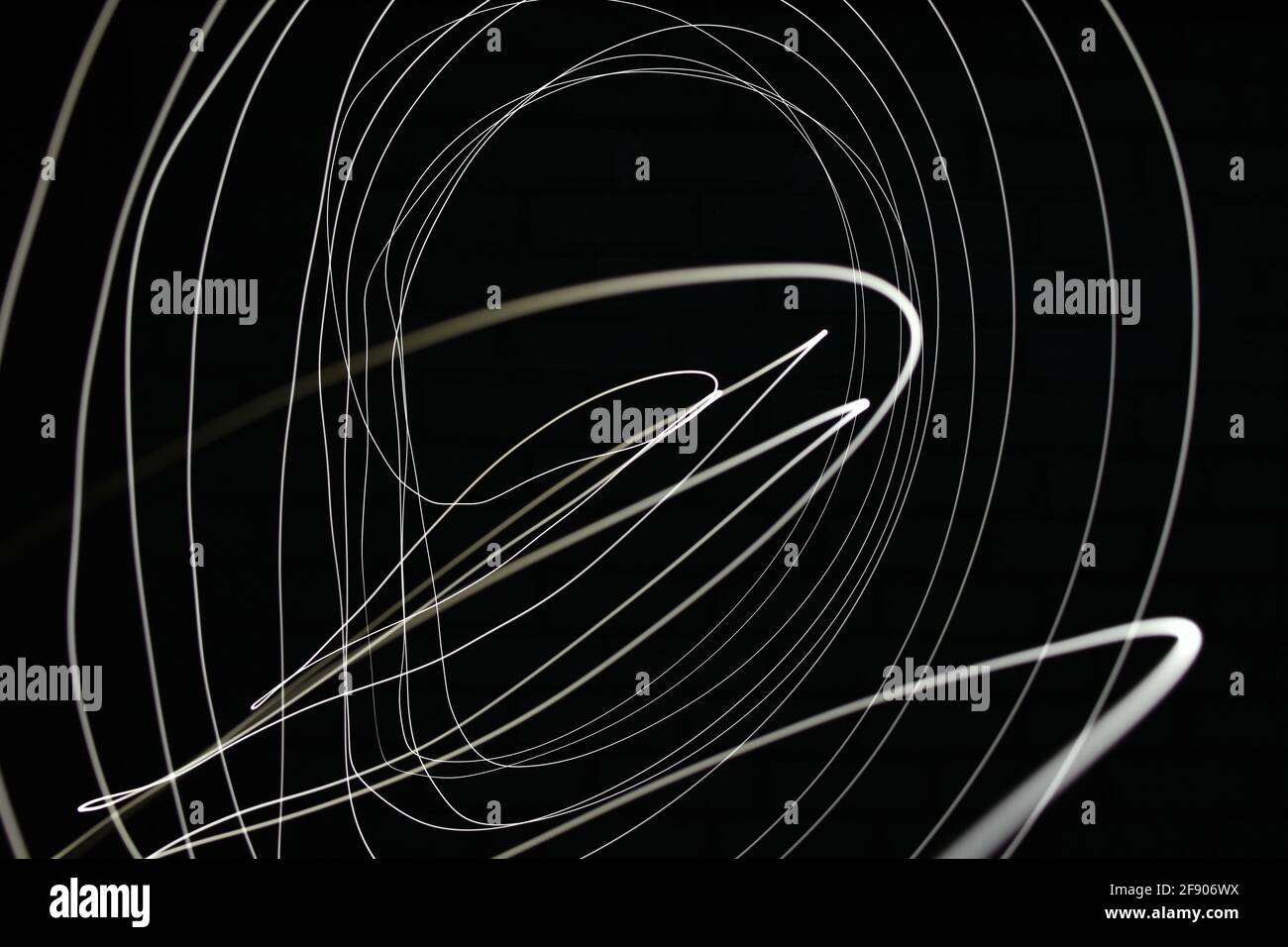 Abstract light stripes on a dark background Stock Photo - Alamy