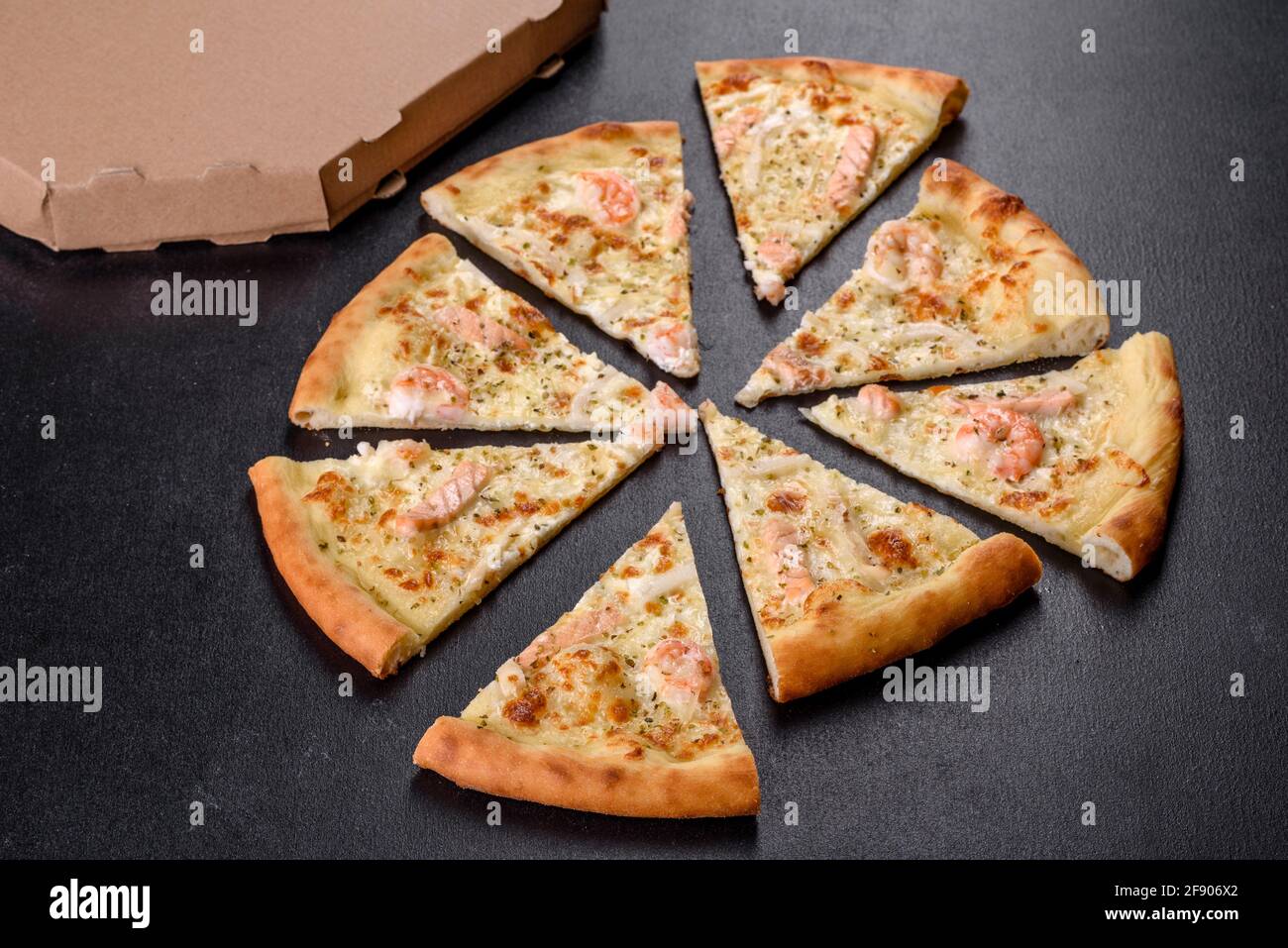 Delicious fresh seafood oven pizza: red fish and shrimp. Healthy food ...