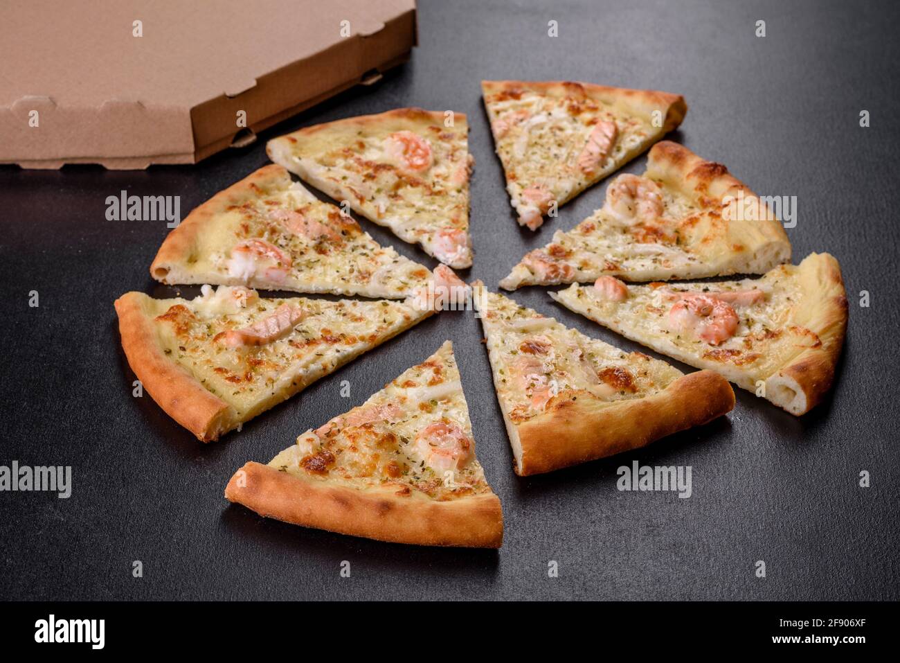 Delicious fresh seafood oven pizza: red fish and shrimp. Healthy food ...