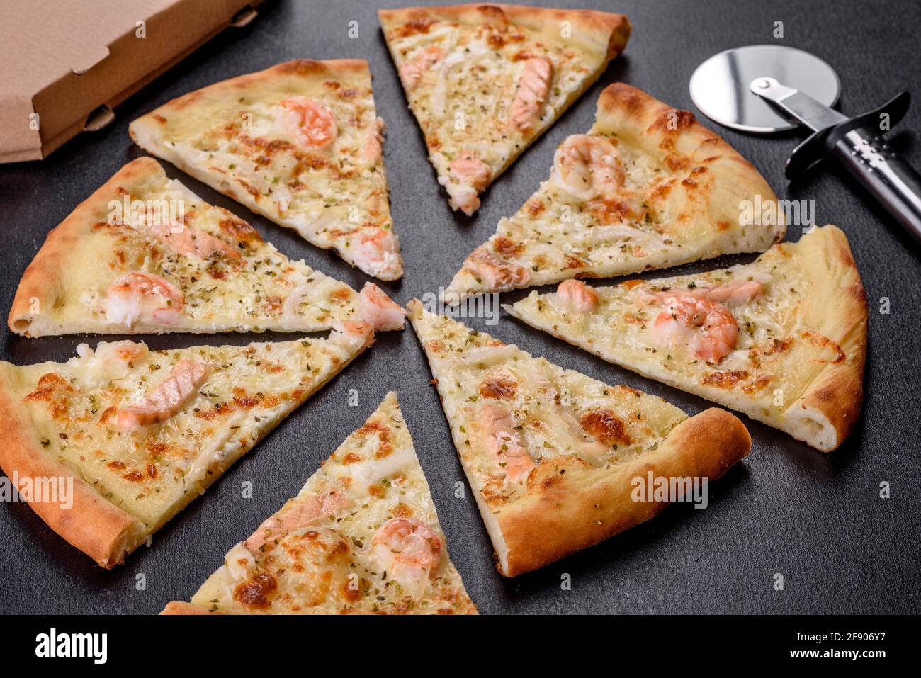Delicious fresh seafood oven pizza: red fish and shrimp. Healthy food ...