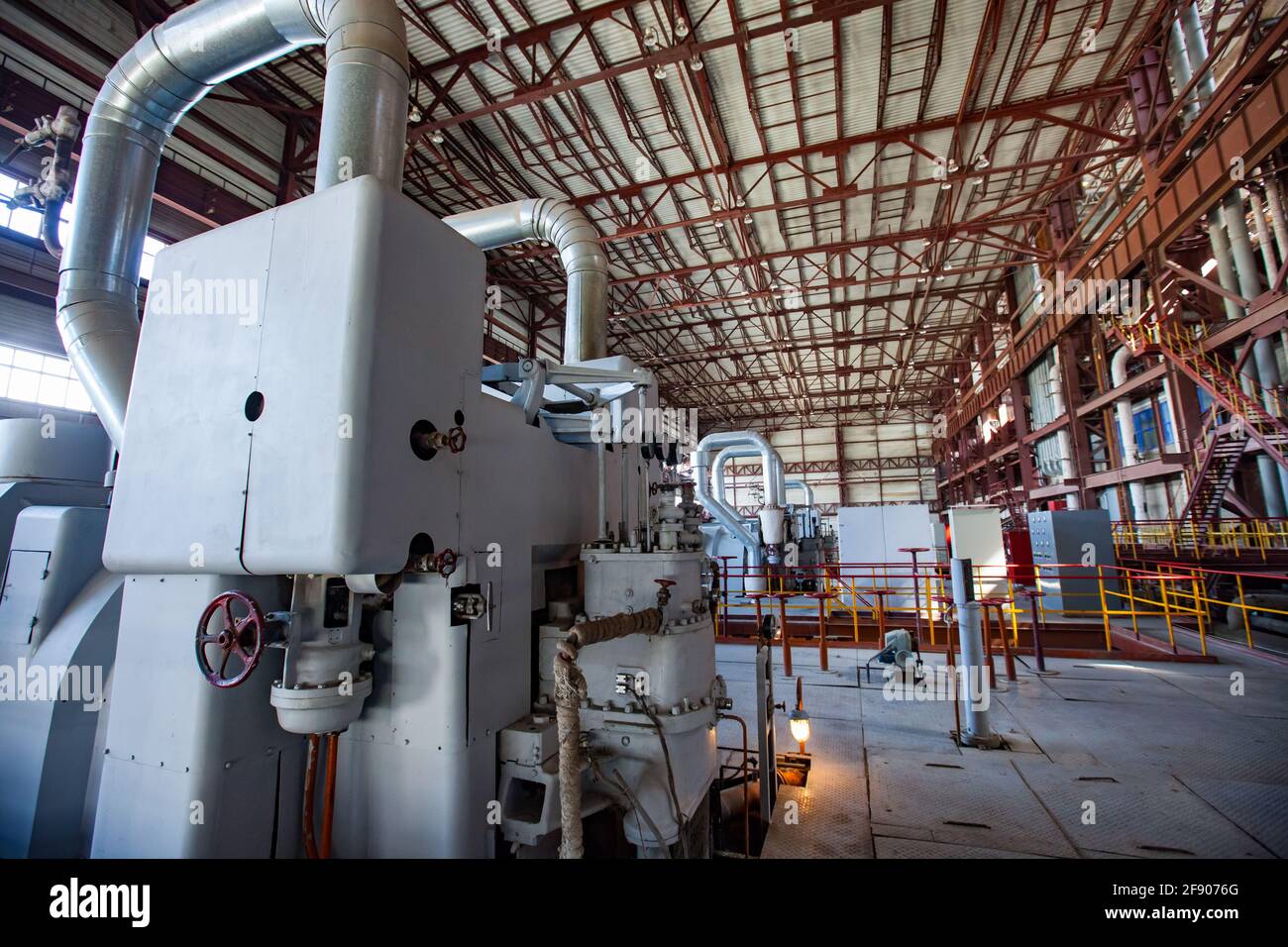 Atyrau, Kazakhstan. Coal heat power plant machine room. Steam turbine ...
