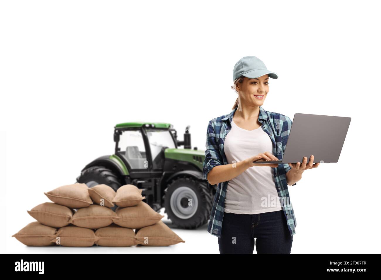 Farmer using tractor Cut Out Stock Images & Pictures - Alamy