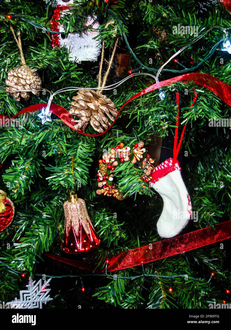Christmas hanging decorations on fir tree. Decorated Christmas tree ...