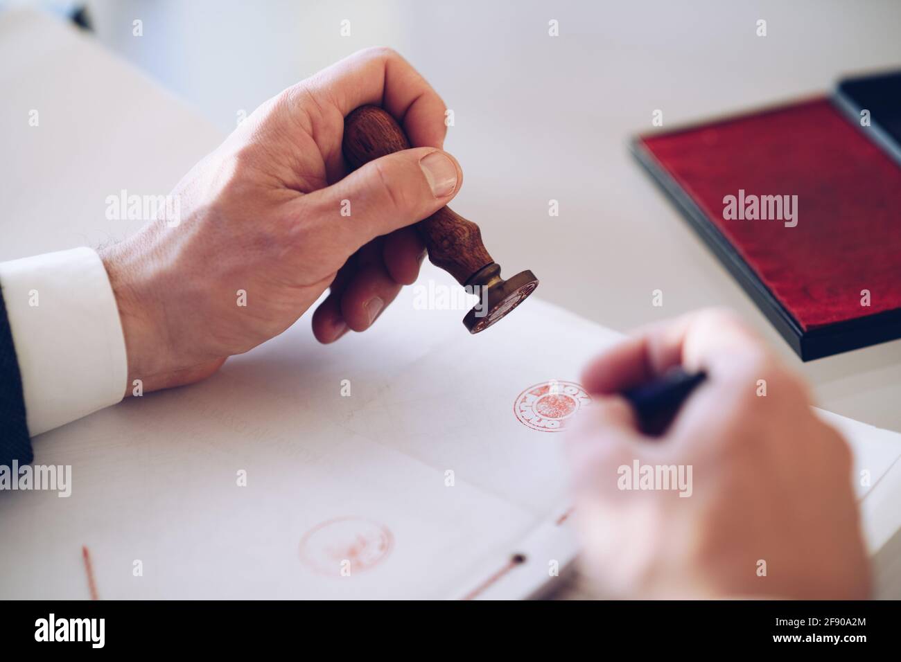 Stamp hand hi-res stock photography and images - Alamy