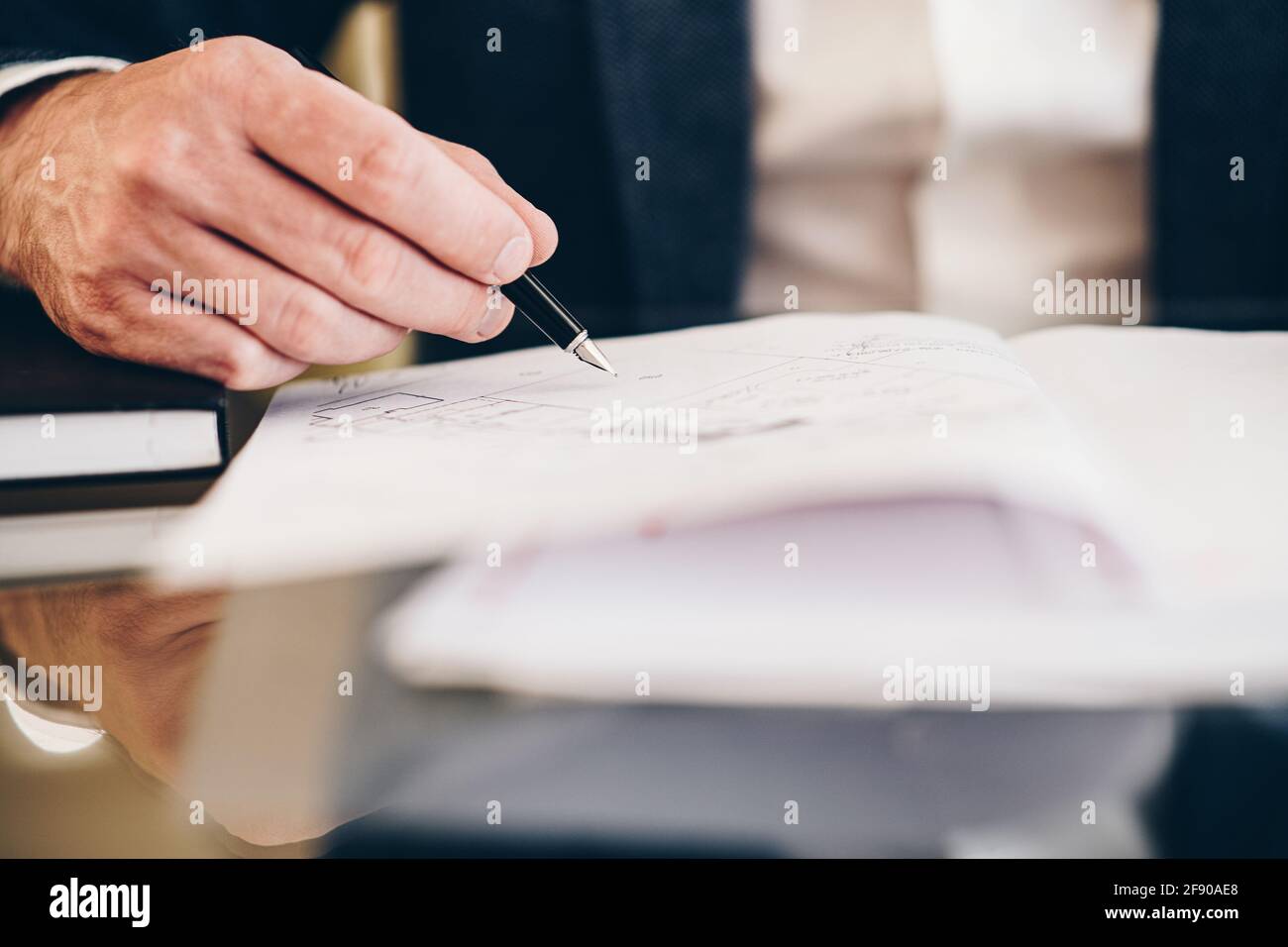 Lawyer, notary public signing document or contract Stock Photo - Alamy