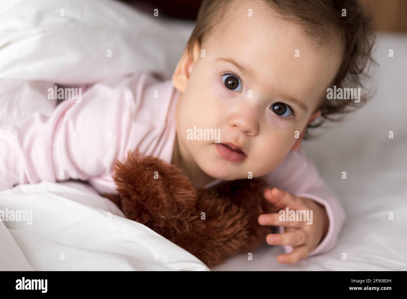 Authentic portrait cute caucasian little infant chubby baby girl or boy ...